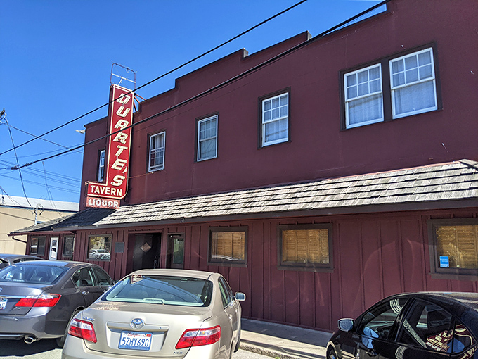 The iconic terracotta-colored exterior of Duarte's Tavern stands like a culinary lighthouse on Pescadero's main street, beckoning hungry travelers with its vintage neon sign.