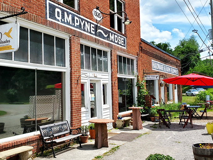 The historic O.M. Pyne building stands as a culinary time machine in tiny Eggleston. Red brick, weathered benches, and small-town charm set the stage for an extraordinary meal.