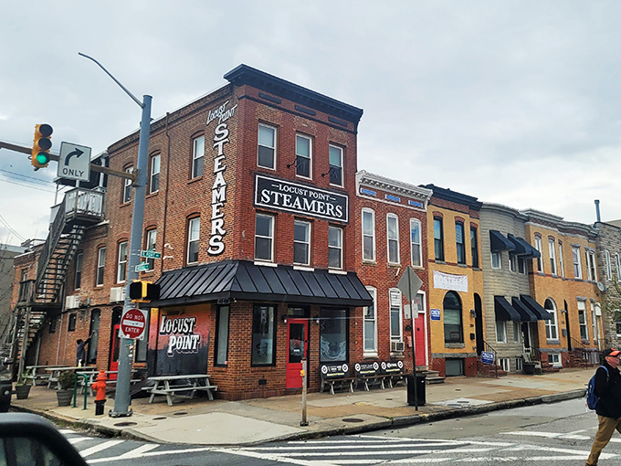 The corner brick building with its vertical "STEAMERS" sign stands like a lighthouse for seafood lovers navigating Baltimore's Locust Point neighborhood.