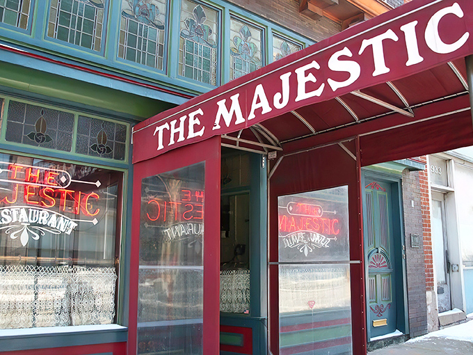 The crimson awning of The Majestic beckons like a time portal to the Prohibition era. History and hunger, satisfied under one historic roof.