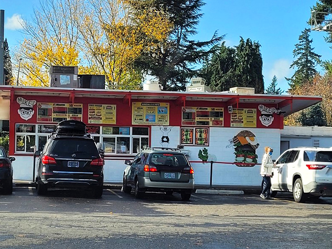 The iconic red exterior of Mike's Drive-In stands as a beacon of burger bliss in Milwaukie, promising nostalgic flavors that never go out of style.