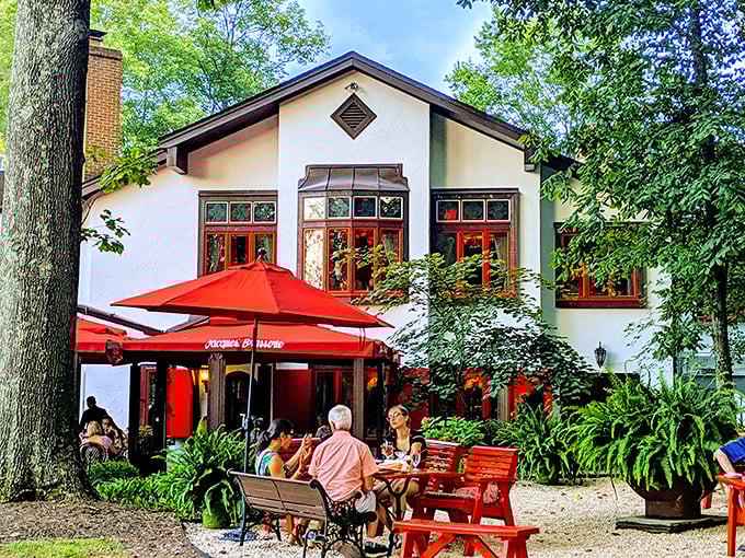 The charming exterior of L'Auberge Chez Fran&ccedil;ois looks like it was plucked from an Alsatian fairy tale and dropped into Virginia's countryside. Those red umbrellas practically whisper, "Come sit, stay awhile."