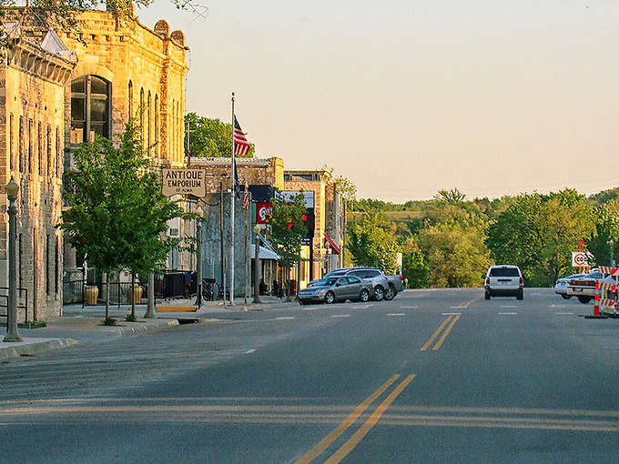 Main Street Alma whispers stories in limestone and light. The golden hour transforms these historic buildings into a postcard from a gentler time.