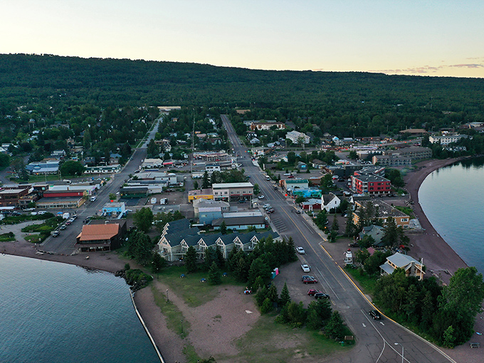 From this bird's-eye view, Grand Marais looks like someone dropped a perfect little village between Lake Superior's vastness and the North Woods' embrace.