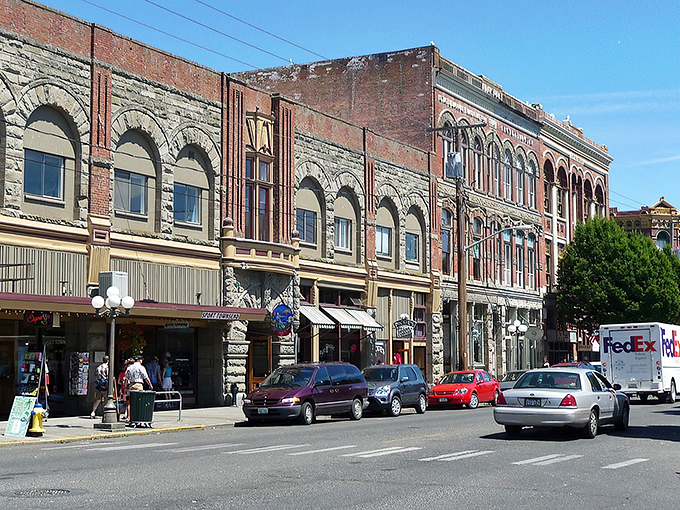 Victorian elegance meets Pacific Northwest charm on Water Street, where brick buildings whisper stories of maritime dreams and the almost-was "New York of the West."