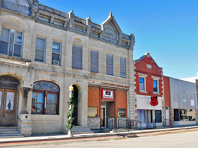 Main Street Alma whispers stories in limestone and light. The golden hour transforms these historic buildings into a postcard from a gentler time.