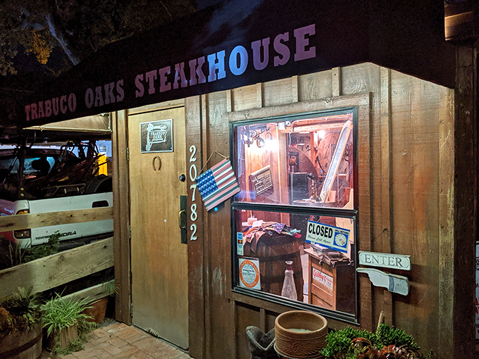 The wooden facade of Trabuco Oaks Steakhouse welcomes you like an old friend, complete with rustic charm and the promise of carnivorous delights ahead.
