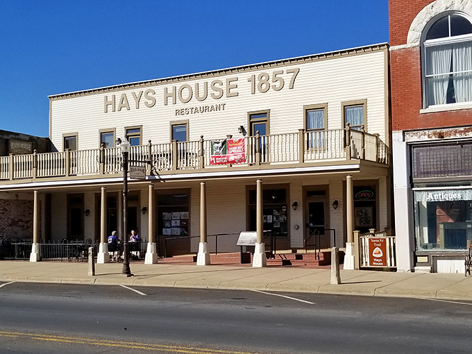 The historic façade of Hays House 1857 stands proudly in Council Grove, a time capsule of frontier hospitality that's witnessed more than a century and a half of American history.