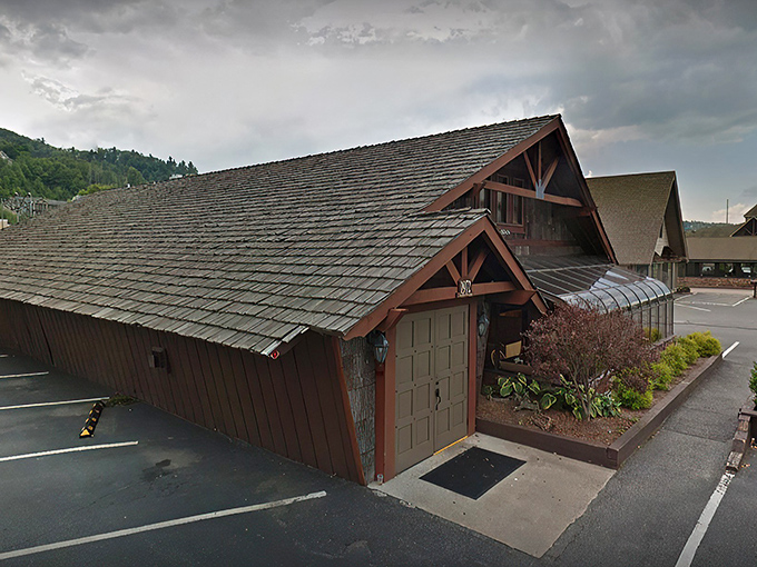 The rustic cabin exterior with its weathered shingles and iconic 1972 entrance doesn't just whisper "come in" &ndash; it practically shouts "carnivorous nirvana awaits!"