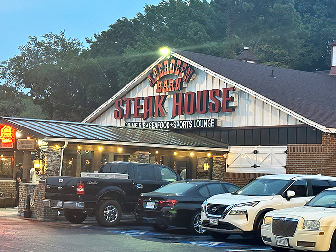 The iconic red lettering of Aberdeen Barn beckons like a lighthouse for hungry souls. This barn-shaped beacon has been guiding steak lovers to beefy bliss for generations.