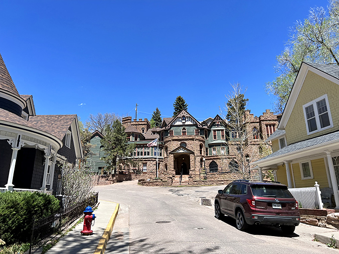 Miramont Castle rises from the Colorado landscape like an architectural fever dream, blending nine different styles into one magnificent stone masterpiece.