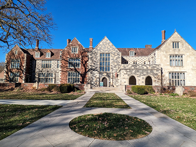 The fa&ccedil;ade of Salisbury House combines red brick and flint-speckled limestone in a Tudor masterpiece that makes Iowa feel decidedly more Downton Abbey than downtown Des Moines.