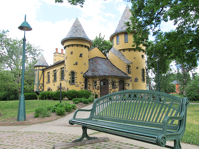 Curwood Castle's fairy-tale turrets and butter-yellow walls make it look like someone dropped a slice of medieval Europe into the Michigan countryside.