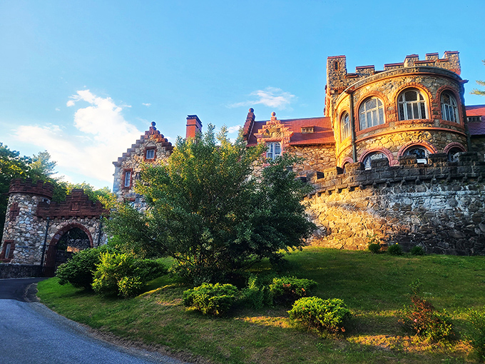 The grand entrance to Searles Castle looks like the perfect setting for a medieval fantasy film, complete with stone turrets and battlements nestled among New Hampshire pines.