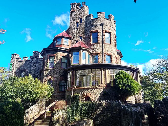 The stone turrets and grand windows of Kip's Castle create a silhouette that would make any medieval monarch do a double-take against New Jersey's blue skies.