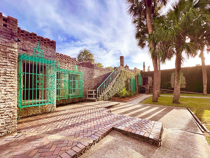 The vine-covered walls of Atalaya Castle create a striking contrast against South Carolina's blue skies, where Mediterranean dreams meet Palmetto State reality.