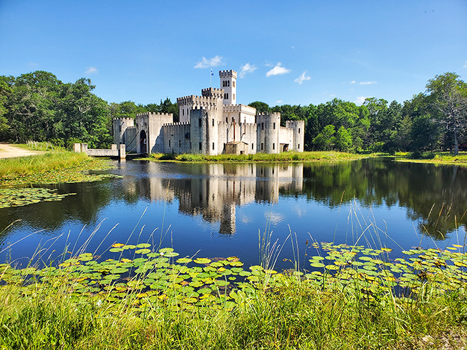 A medieval mirage rising from the Texas countryside, complete with moat and lily pads. Camelot meets cattle country in spectacular fashion.