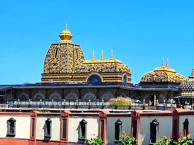 The golden domes of Prabhupada's Palace catch the sunlight like jewelry against West Virginia's blue skies. Who ordered a slice of India with their mountain views?