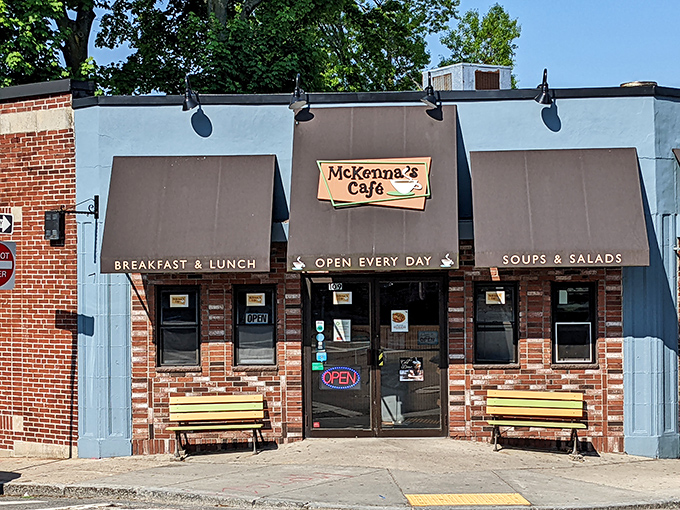 The modest brick exterior of McKenna's Cafe belies the breakfast paradise within. Yellow benches stand ready for hungry patrons awaiting their French toast fix.