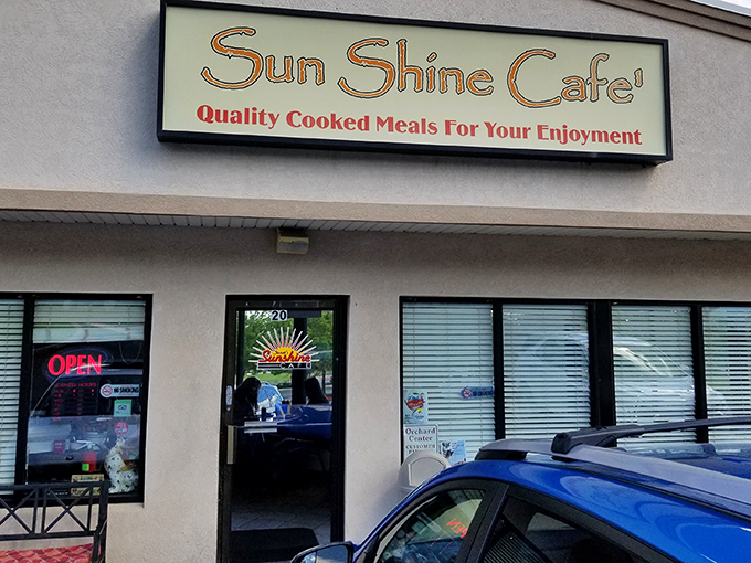 The unassuming storefront that houses breakfast magic. Like finding a treasure map in your attic, this sign promises adventure for your taste buds.