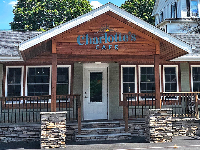 The welcoming wooden facade of Charlotte's Cafe beckons like an old friend, promising comfort and culinary delights within its cozy walls.