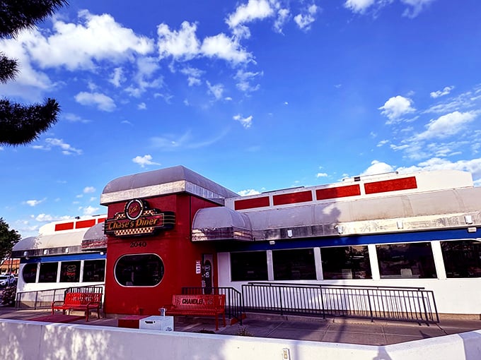 The red and white facade of Chase's Diner shines like a beacon against the Arizona sky, promising comfort food salvation to hungry travelers.