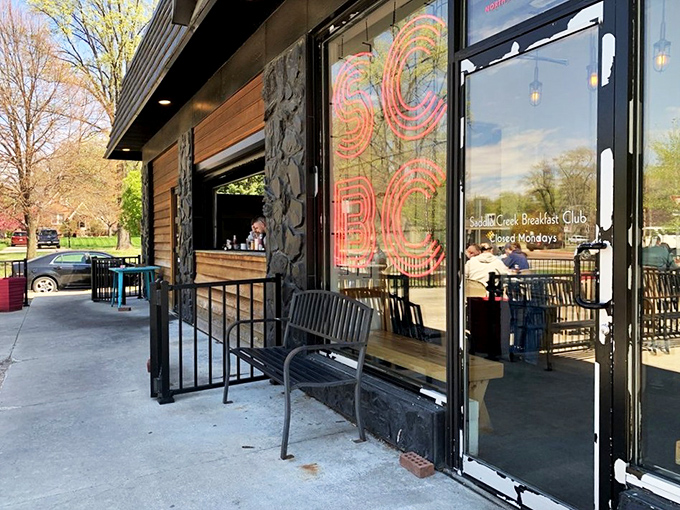 The neon glow of SCBC beckons breakfast enthusiasts like a pink lighthouse guiding hungry sailors to shore. Modern meets cozy in this distinctive Omaha storefront.
