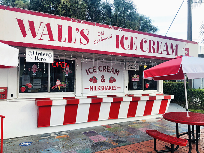 The classic red and white exterior of Wall's beckons like a sweet mirage under swaying palms, promising frozen salvation from Miami's relentless sunshine.