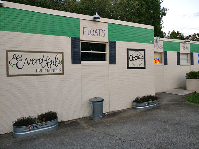 The brilliant blue sign of Ozzie's against white brick is like a beacon for ice cream lovers&mdash;simplicity that promises sweet perfection inside.