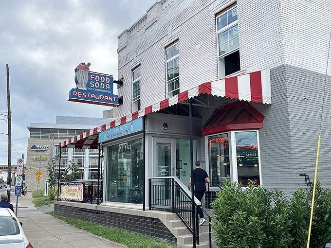 The iconic neon sign beckons like a lighthouse for the hungry soul. Nashville's culinary time capsule has been glowing since 1939.
