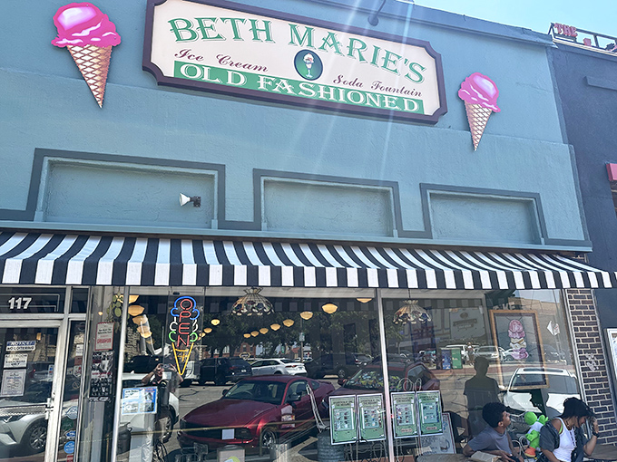 The mint-green facade with those iconic ice cream cone signs is like a beacon of sweetness on Denton's historic square.