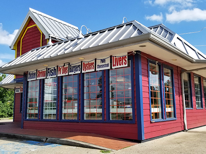 The bright red exterior with yellow trim isn't trying to be subtle. Like a Southern grandma, it proudly announces: "I've got something good for you!