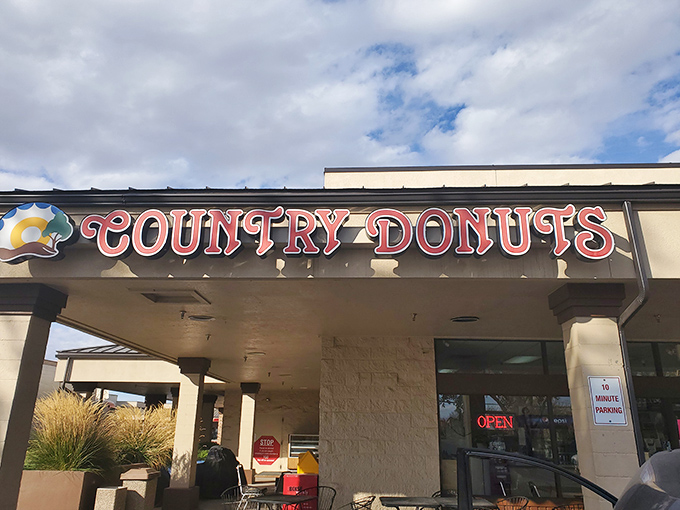 The unassuming storefront promises nothing fancy&mdash;just the sacred covenant of exceptional donuts waiting inside. Simple, straightforward, perfect.