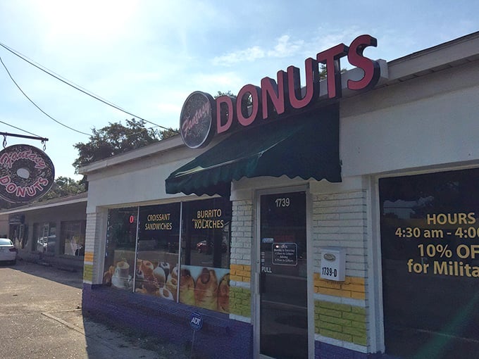 The unassuming exterior of Fantasy Donuts belies the culinary treasures within. Early birds line up before dawn for first dibs on freshly fried delights. 