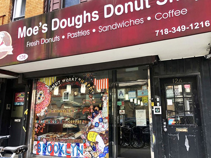 The unassuming burgundy awning of Moe's Doughs stands as Brooklyn's sweetest secret hiding in plain sight, complete with vintage charm and bicycles parked hopefully nearby.