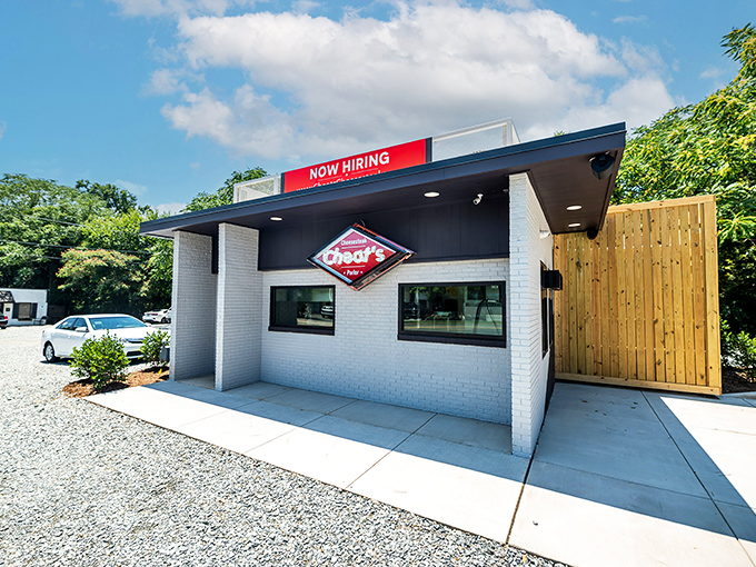 The unassuming white brick exterior of Cheat's Cheesesteaks proves once again that culinary treasures often hide in the simplest packages.