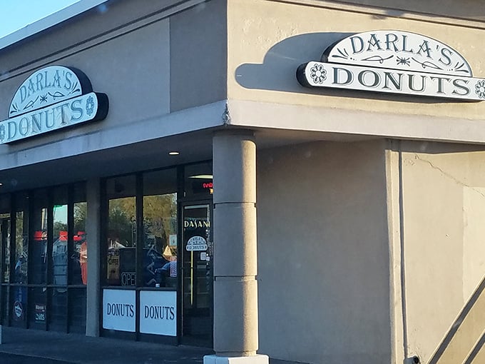 The unassuming storefront of Darla's Donuts stands like a beacon of hope for the sugar-deprived. No fancy frills, just the promise of donut perfection within.