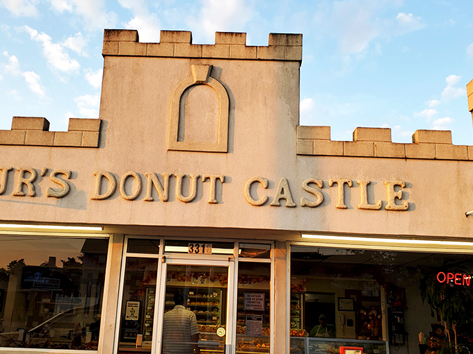 Not all castles have moats and dragons. This one defends against hunger with a fortress of fried dough and a blue-gray fa&ccedil;ade that says "royalty of the breakfast realm."