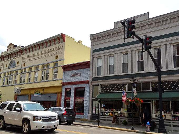 Downtown Lewisburg's historic buildings stand like colorful sentinels of another era, where modern commerce meets 18th-century architecture in perfect harmony.