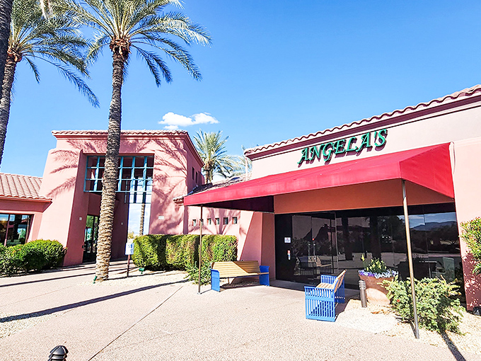Angela's Kitchen welcomes you with its warm terracotta exterior and vibrant red awning&mdash;like a sunset-colored beacon for hungry souls in Surprise.