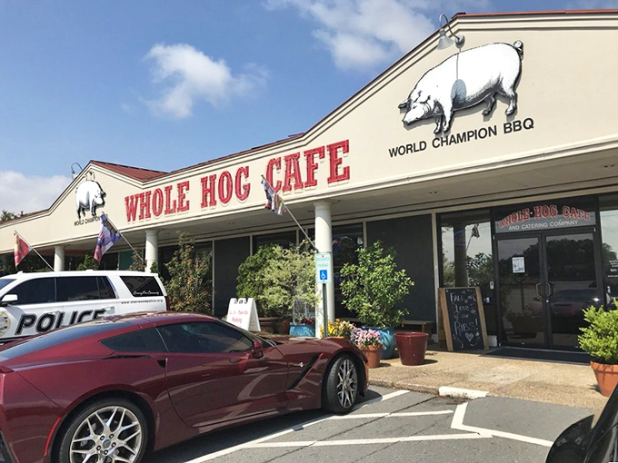 The unassuming facade of Whole Hog Cafe proudly announces its "World Champion BBQ" status—like a poker player who doesn't need to bluff.