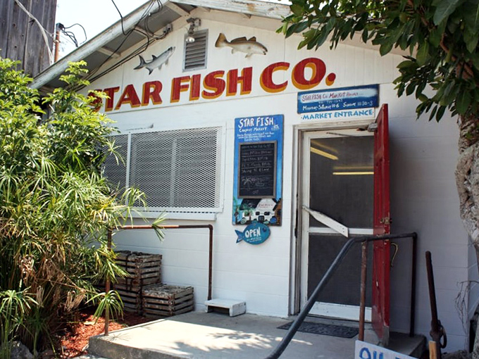 The unassuming entrance to seafood paradise. No fancy awnings or valet parking here&mdash;just the promise of ocean-fresh delights inside.