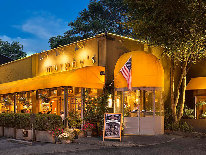 Murphy's signature yellow awning stands like a beacon of culinary delight in Atlanta's Virginia-Highland neighborhood, promising comfort and indulgence just beyond those doors.