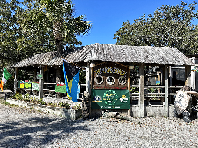 The weathered exterior of The Crab Shack stands as a beacon of seafood authenticity on Tybee Island. No fancy facades needed when what's inside is this good. 