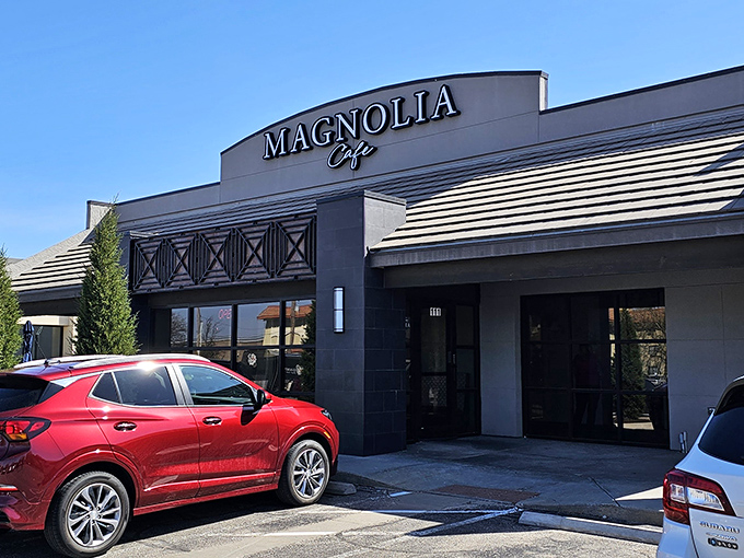 The sleek gray exterior of Magnolia Cafe stands like a culinary beacon in Wichita, promising delicious adventures within. That evergreen isn't just decoration&mdash;it's your first hint of the freshness awaiting inside.