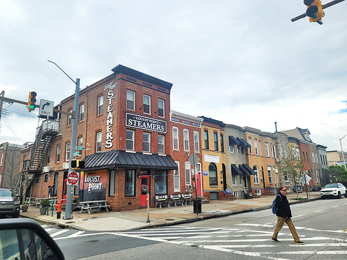 The corner brick building with its iconic vertical "STEAMERS" sign stands like a lighthouse for hungry seafood pilgrims in Baltimore's Locust Point neighborhood.