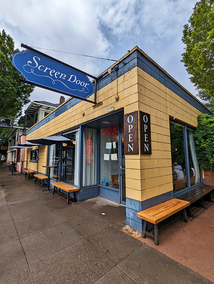 The iconic blue sign against a cheerful yellow exterior says it all: culinary treasures await inside this Portland institution.