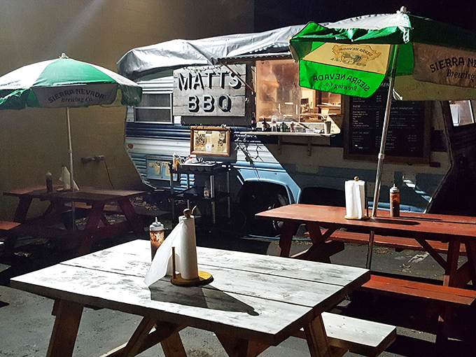 The covered dining area at Matt's BBQ offers the perfect blend of Portland's outdoor vibe and Texas-style communal eating. Picnic tables await hungry patrons. 