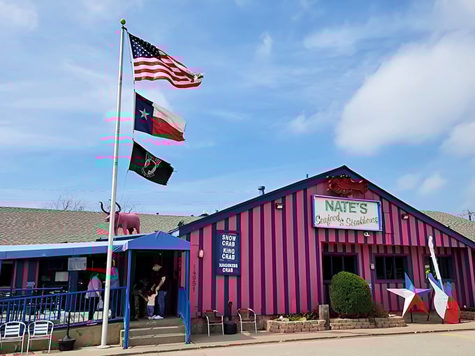 The pink-striped exterior of Nate's stands out like a flamingo in a penguin colony. Three flags flutter above this unassuming seafood sanctuary in Addison.