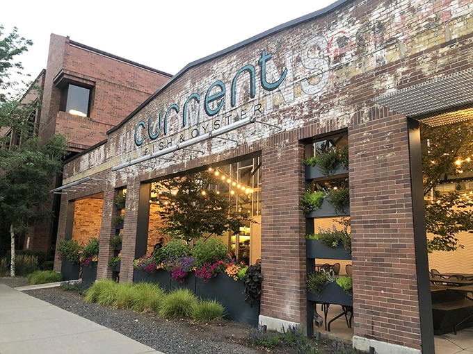 The weathered brick exterior of Current Fish and Oyster feels like a secret you've stumbled upon&mdash;a coastal gem hiding in plain sight in downtown Salt Lake City.